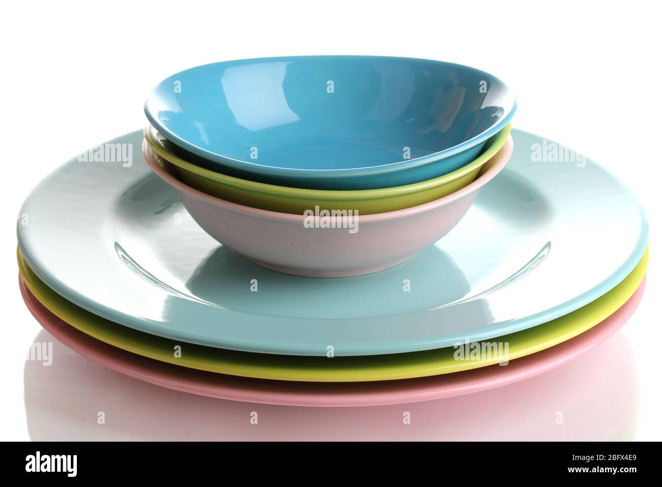 Colorful plates isolated on white Stock Photo - Alamy