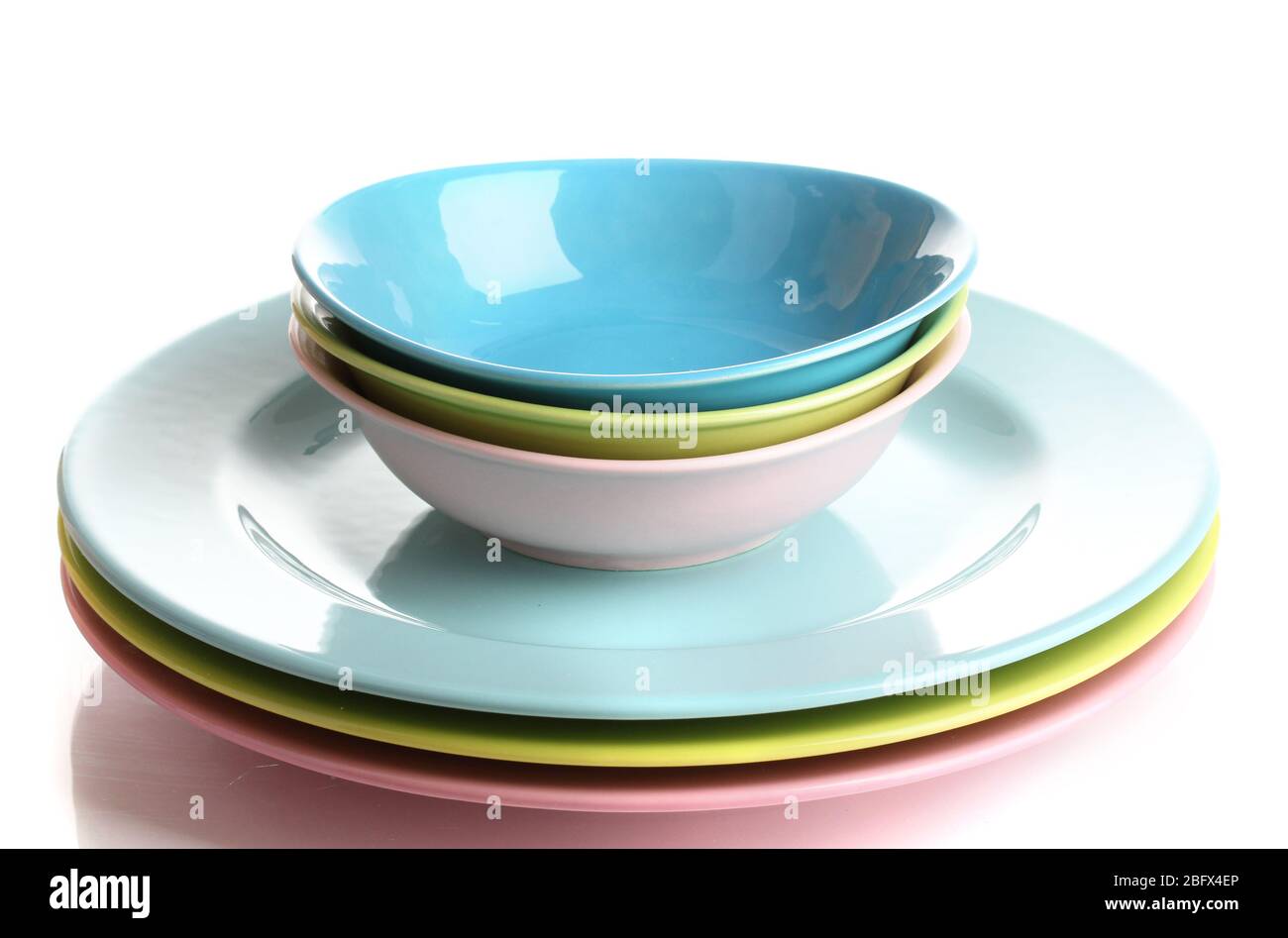 Colorful plates isolated on white Stock Photo - Alamy