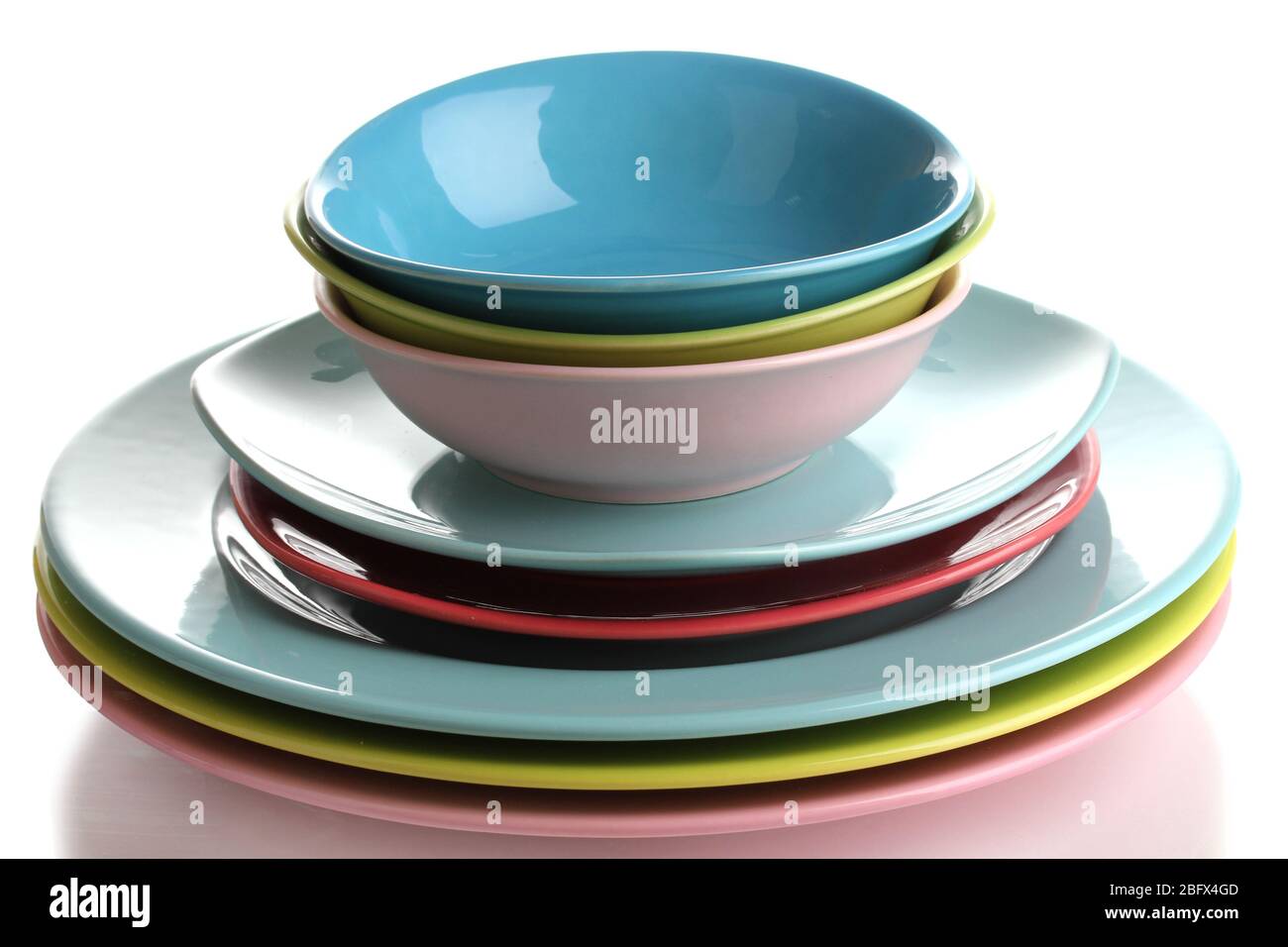 Colorful plates isolated on white Stock Photo - Alamy