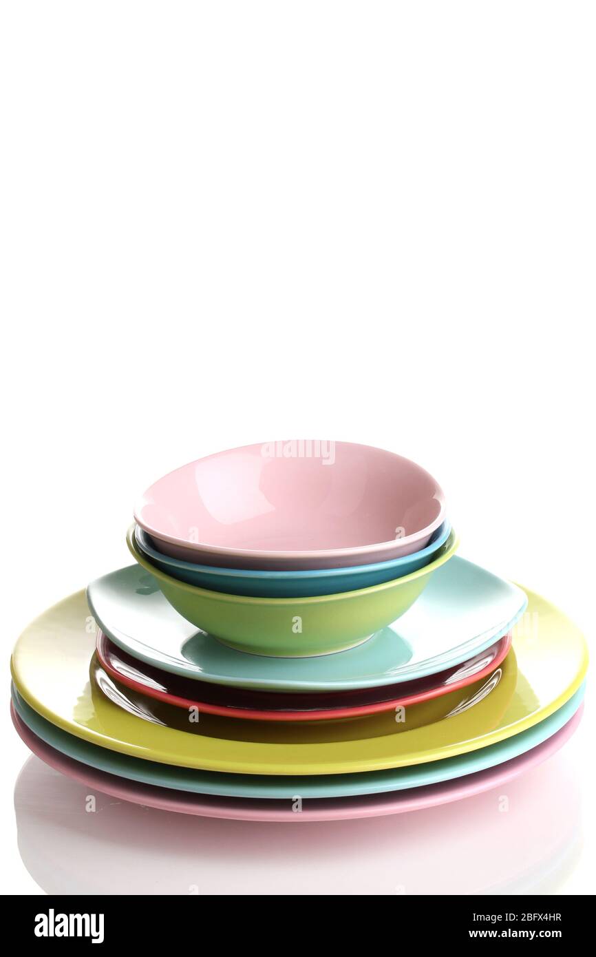 Colorful plates isolated on white Stock Photo - Alamy
