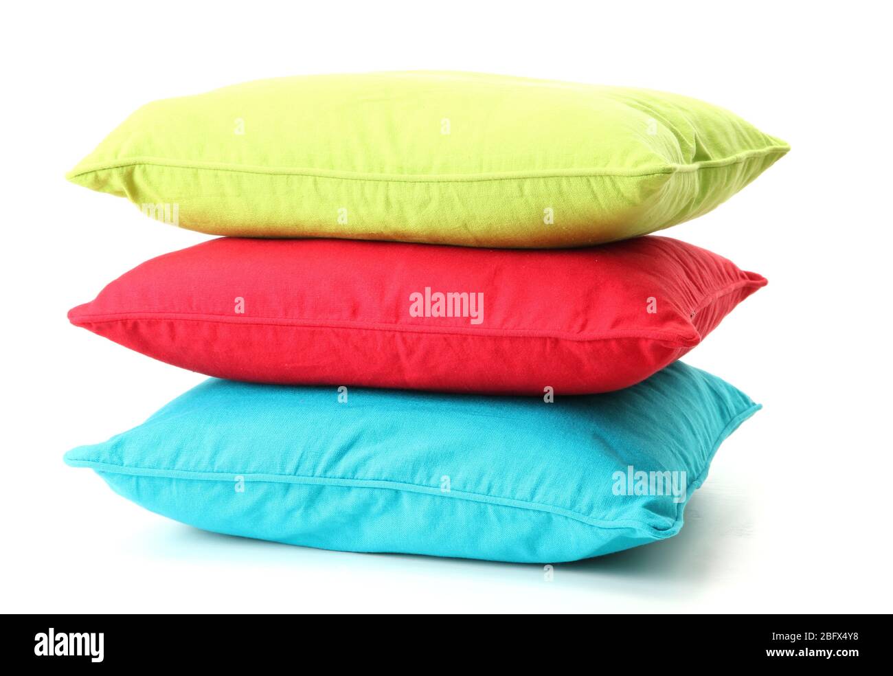 Colorful pillows isolated on white Stock Photo - Alamy