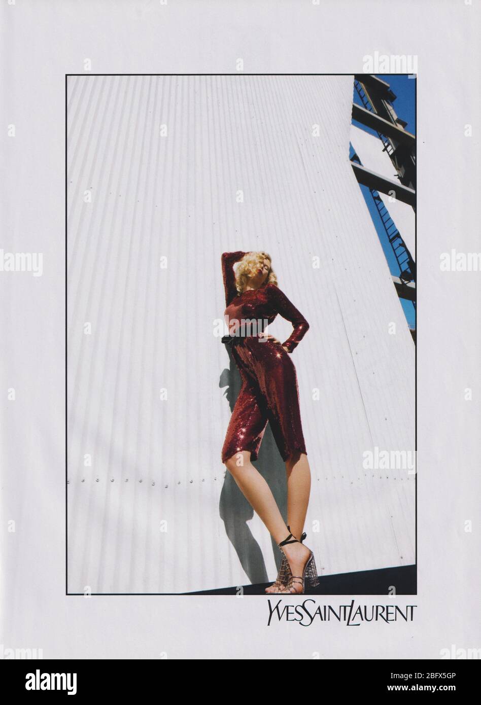 poster advertising Yves Saint Laurent fashion house with Claudia ...