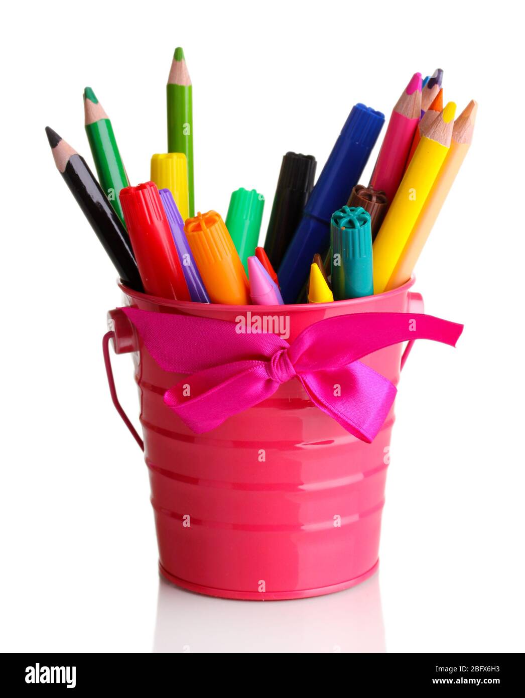 Colorful pencils and felt-tip pens in pink pail isolated on white Stock ...