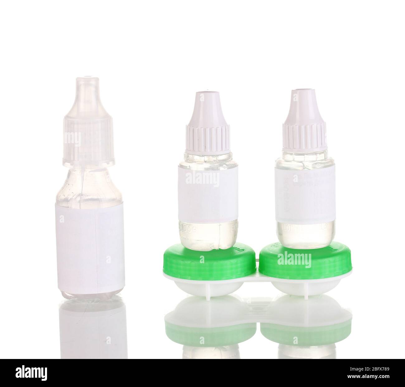Eye drops and lenses isolated on white Stock Photo - Alamy