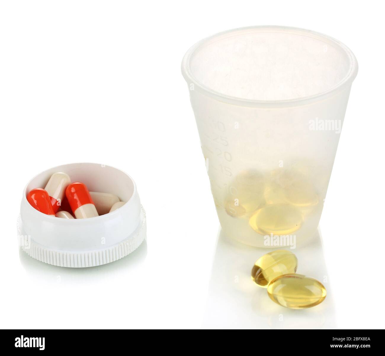 Dispensers for tablets with pills isolated on white Stock Photo - Alamy