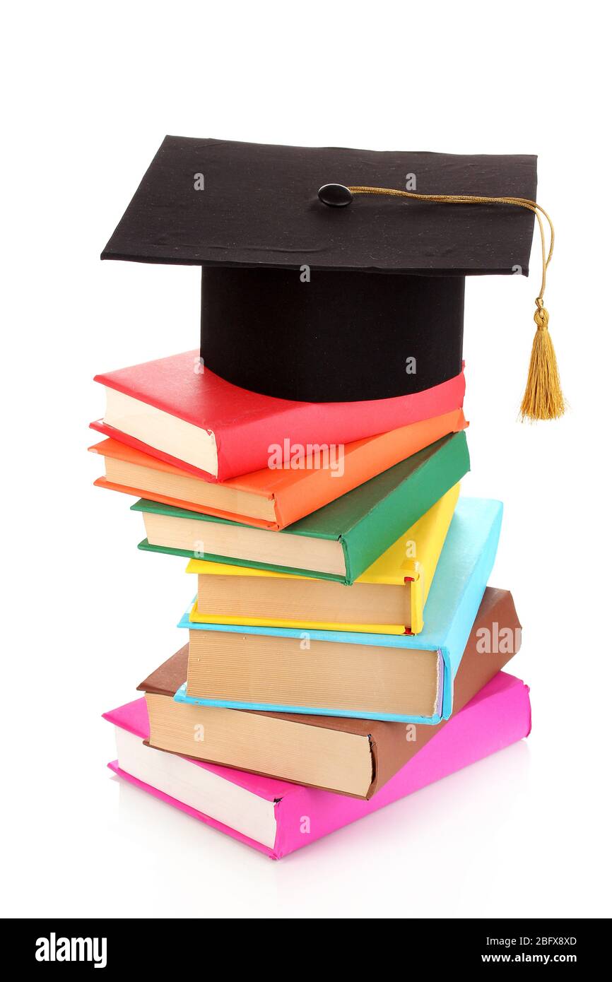 Grad hat with books isolated on white Stock Photo - Alamy
