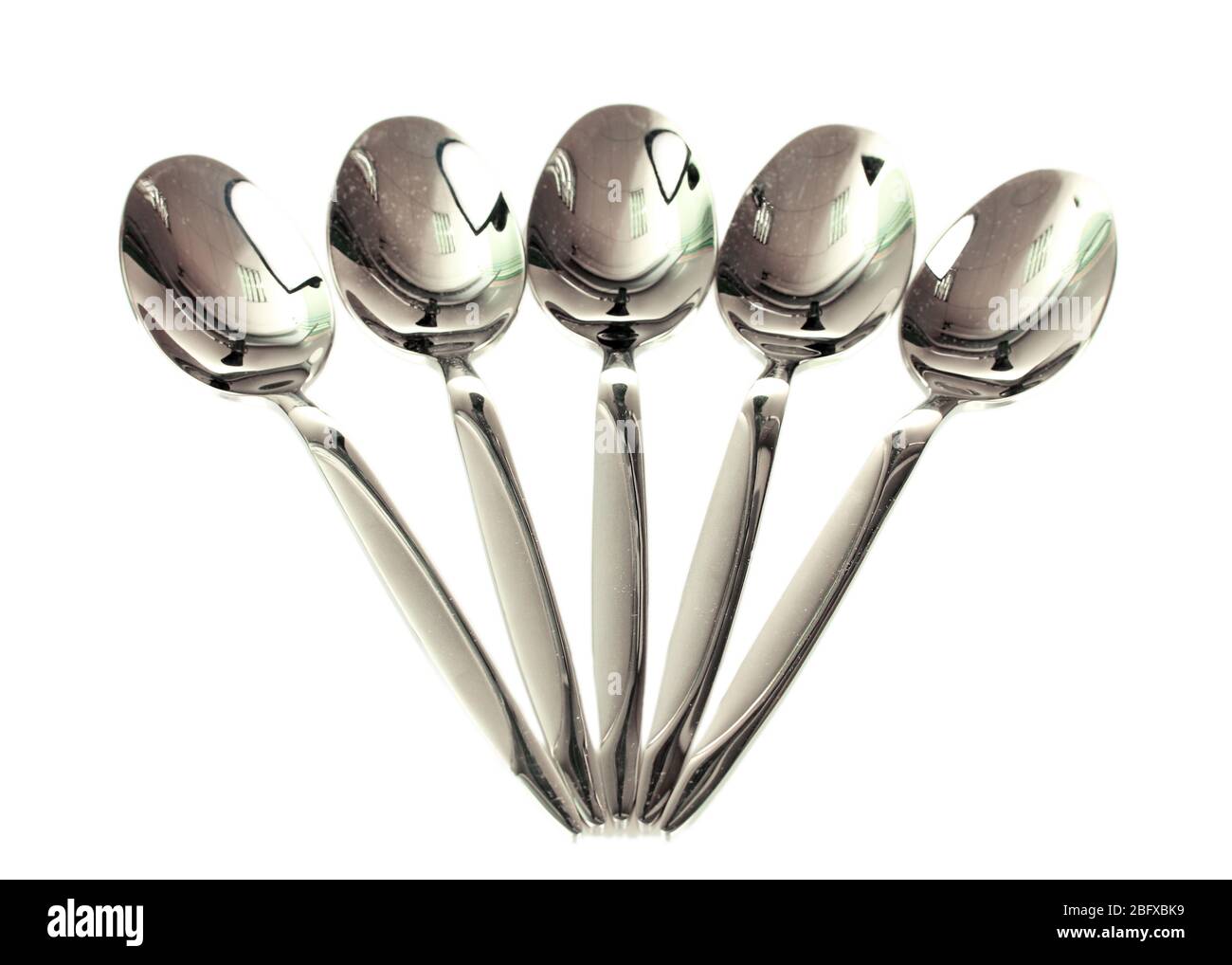 a set of spoons isolated on white Stock Photo - Alamy