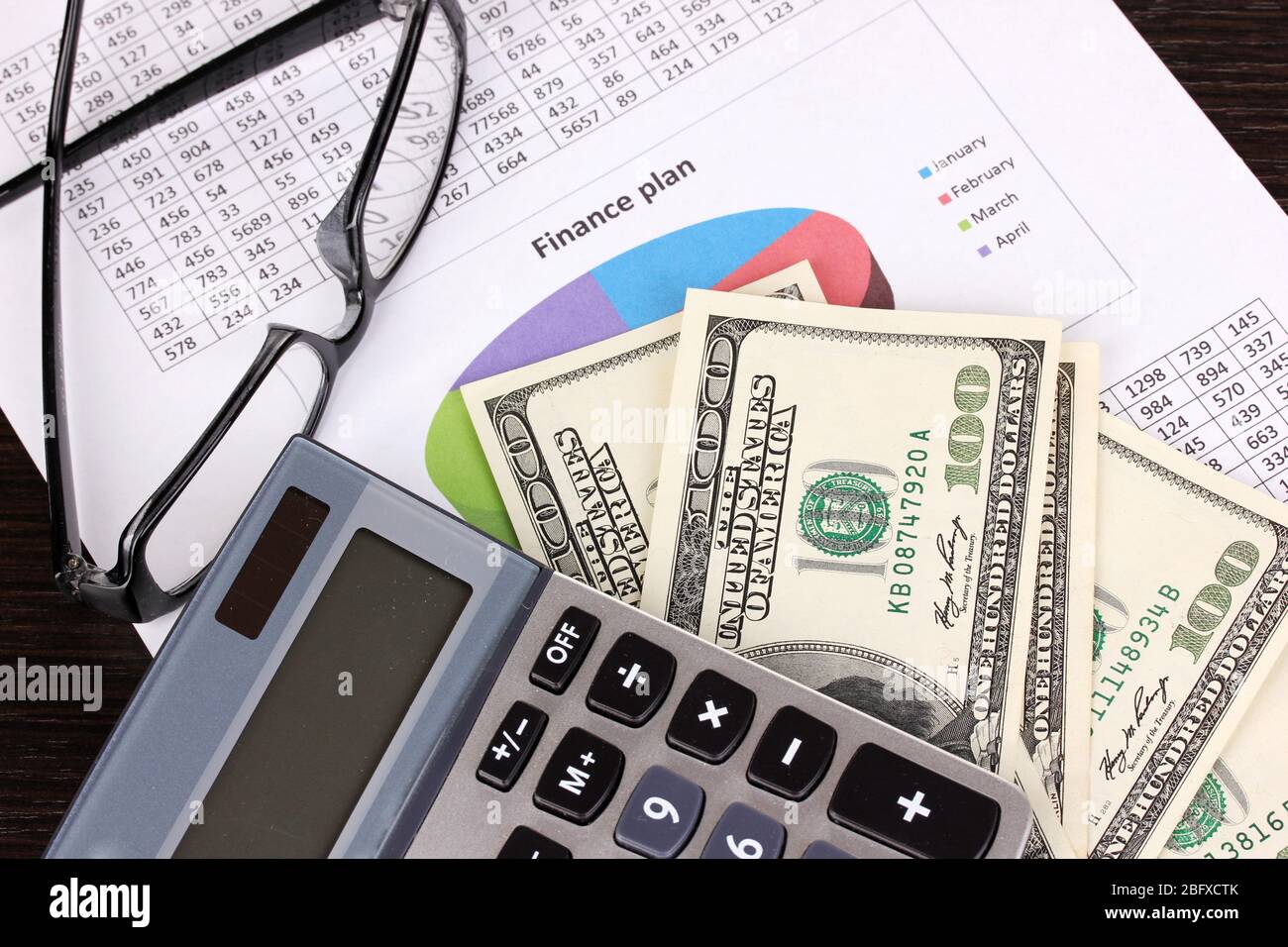 Documents, money and glasses close-up Stock Photo - Alamy