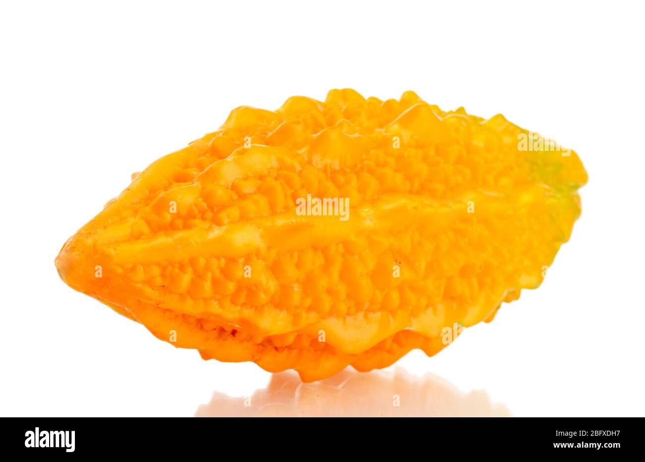 ripe momordica fruit, isolated on white Stock Photo - Alamy