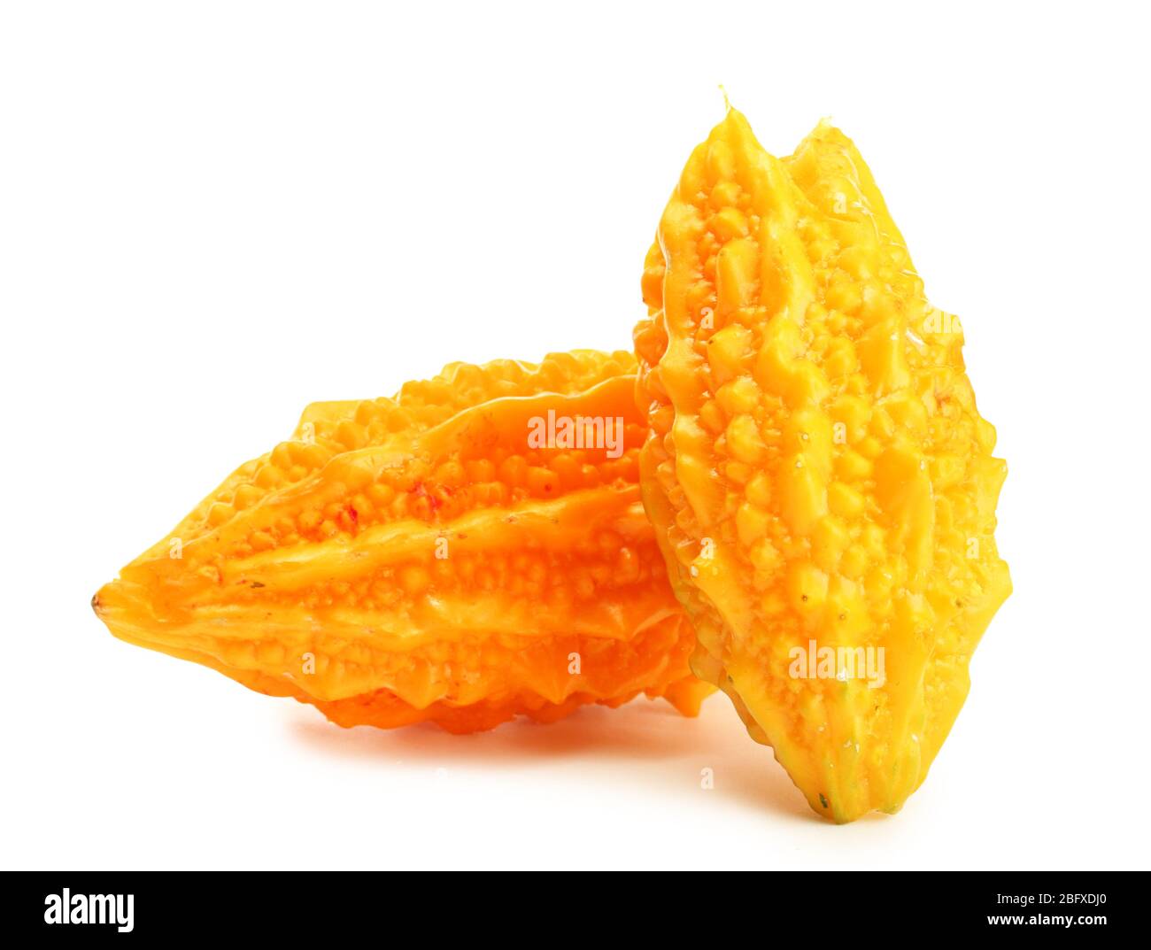 ripe momordica fruits, isolated on white Stock Photo - Alamy