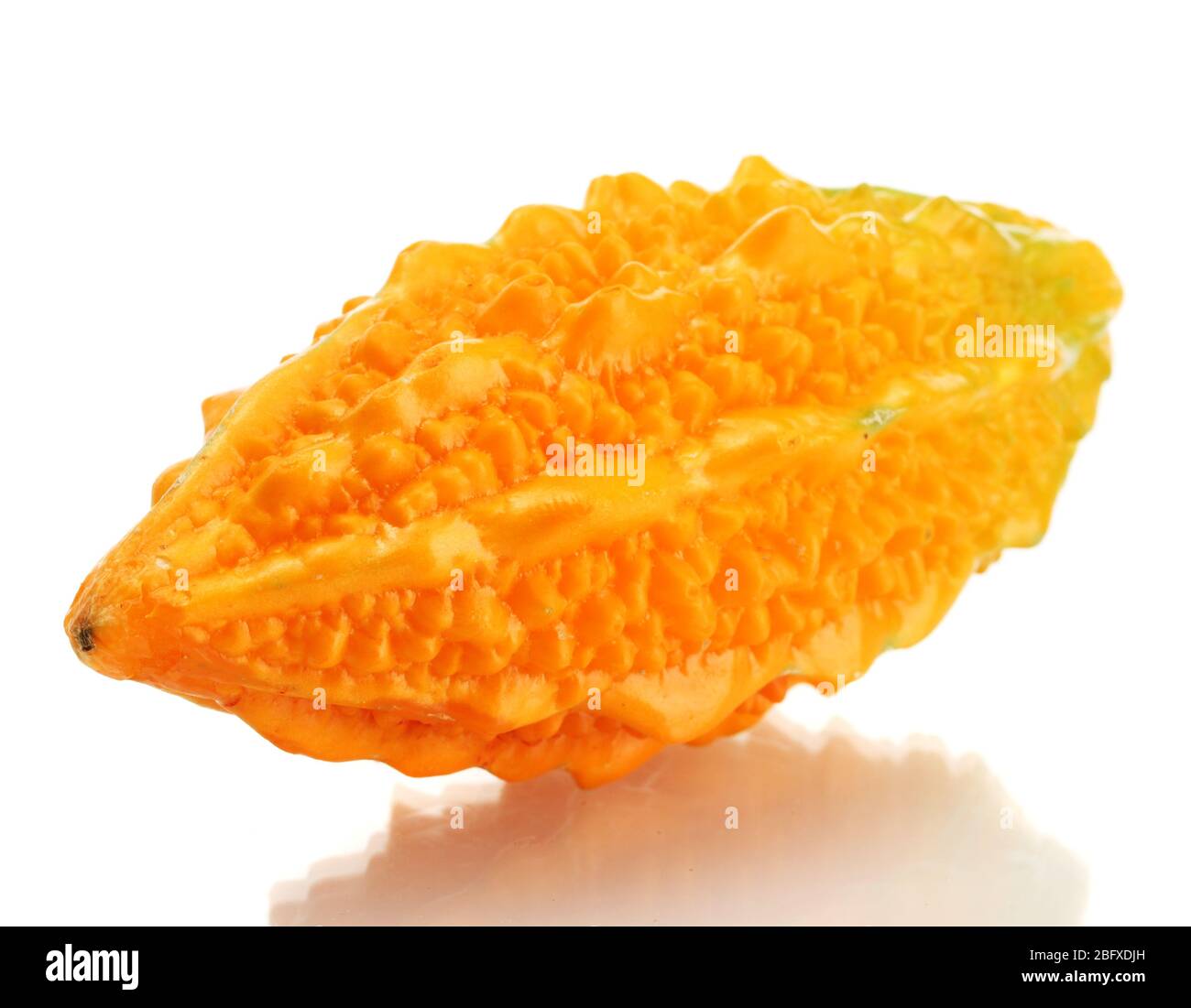 ripe momordica fruit, isolated on white Stock Photo - Alamy