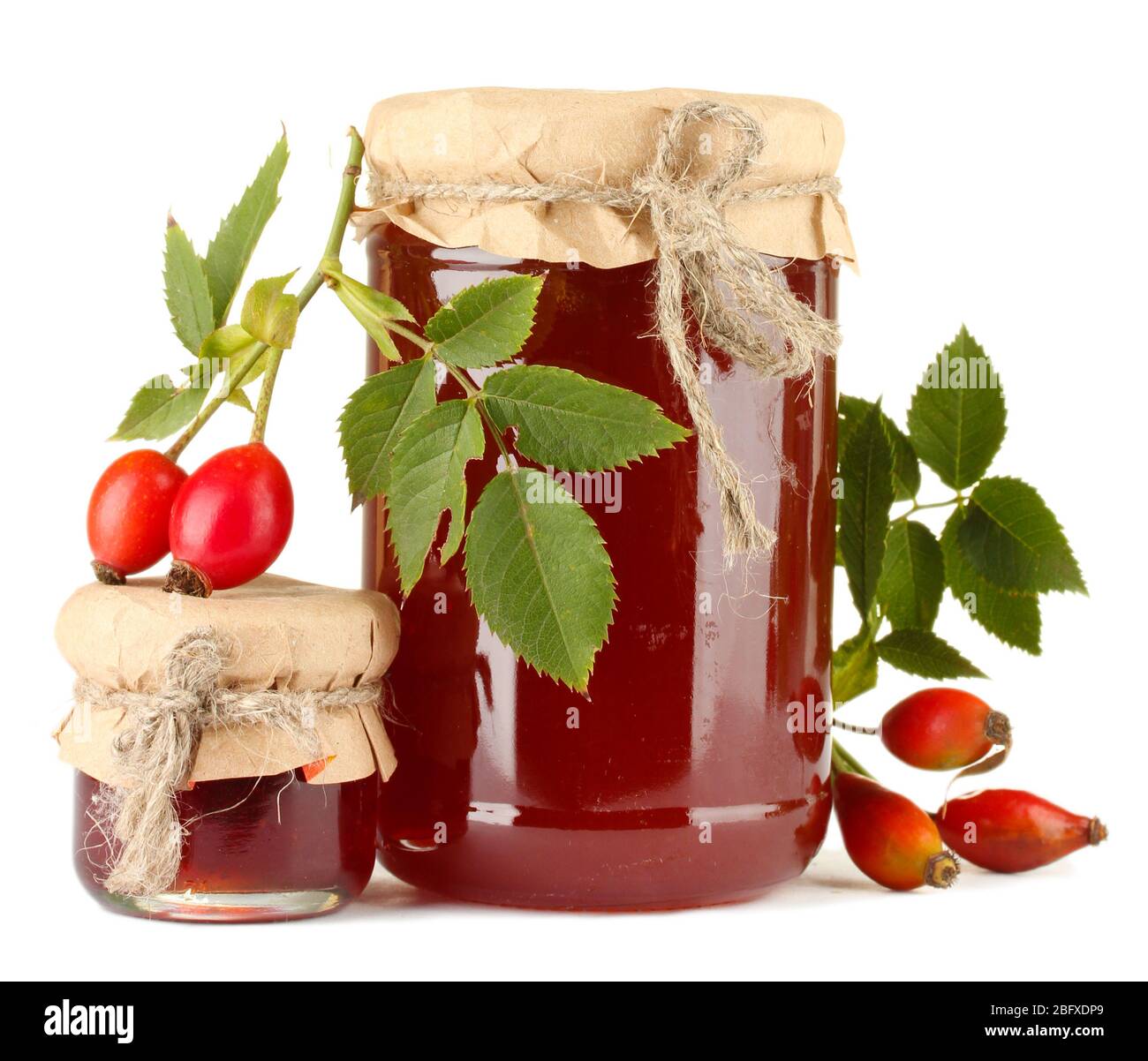 jars with hip roses jam and ripe berries, isolated on white Stock Photo ...