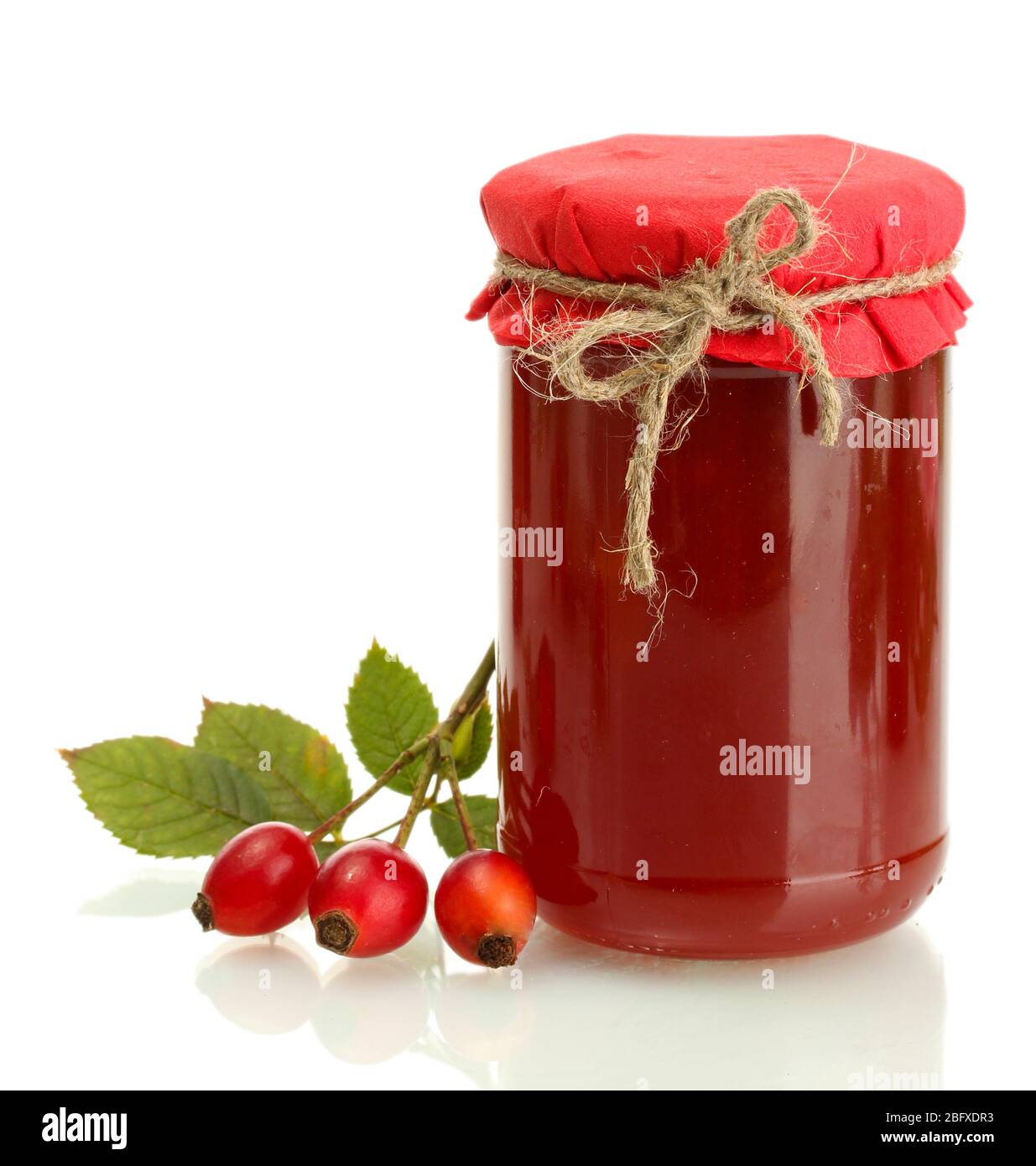 jar with hip roses jam and ripe berries, isolated on white Stock Photo ...