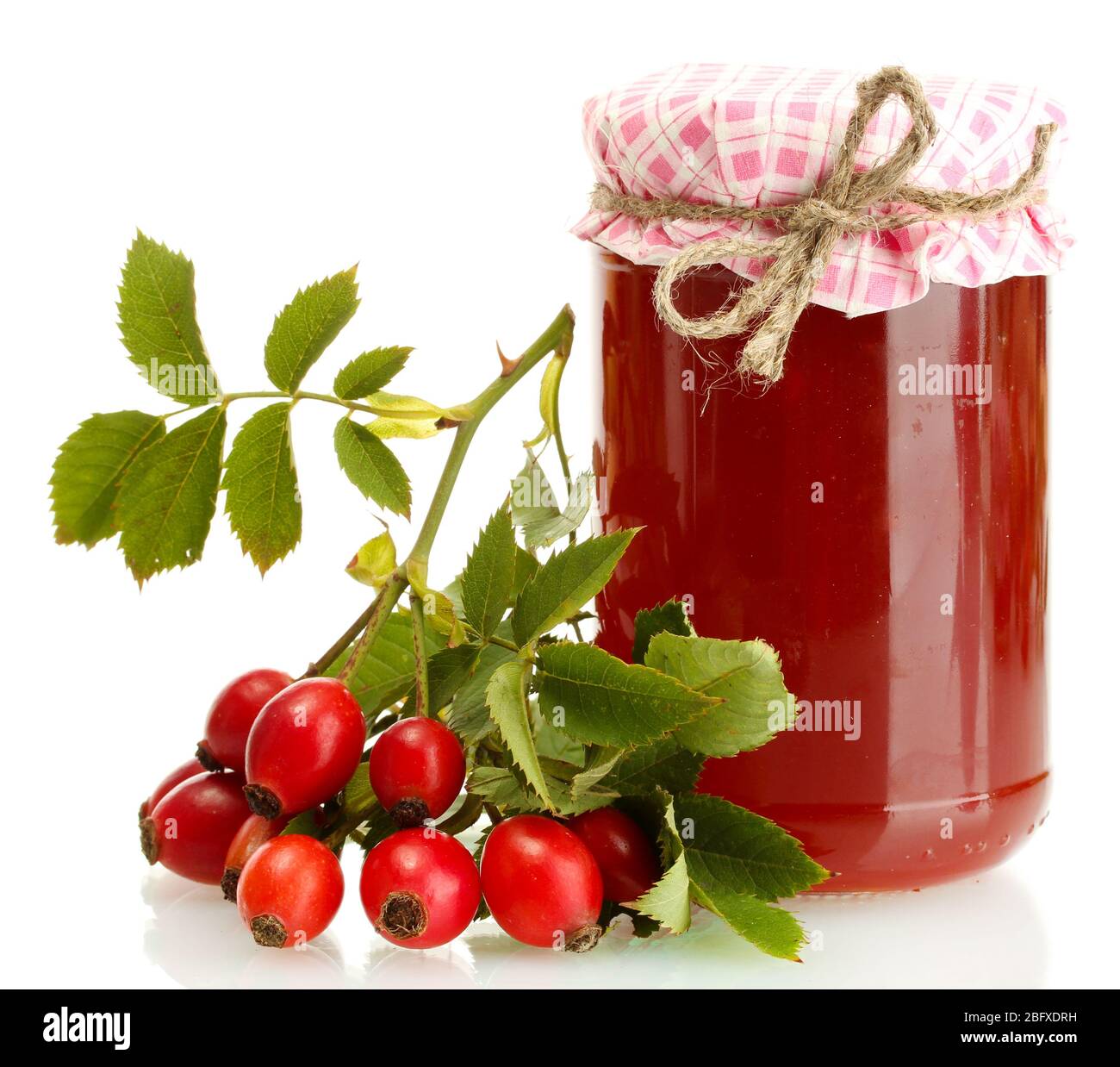 jar with hip roses jam and ripe berries, isolated on white Stock Photo ...