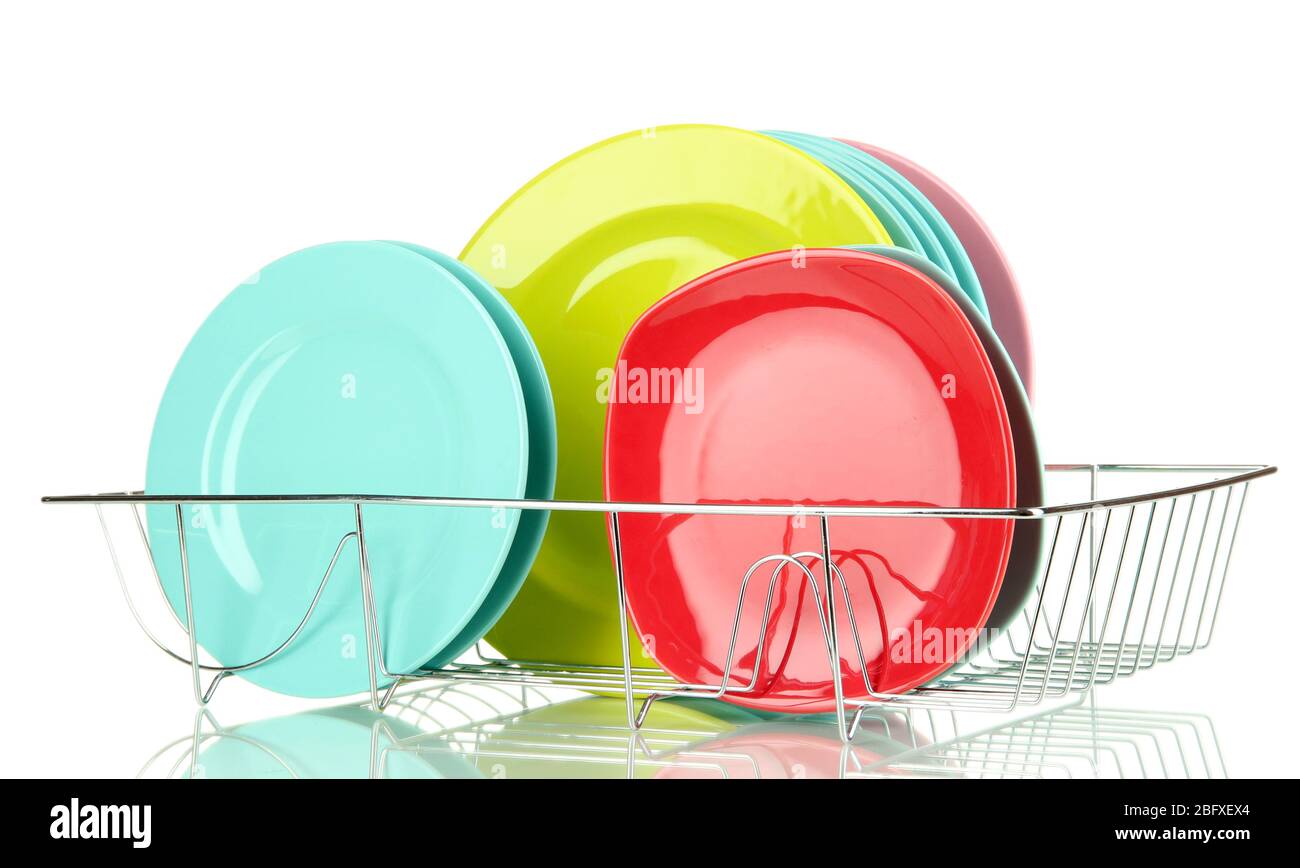 Color plates in rack isolated on white Stock Photo - Alamy