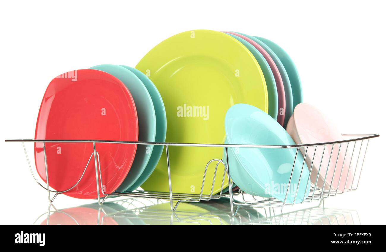 Color plates in rack isolated on white Stock Photo - Alamy