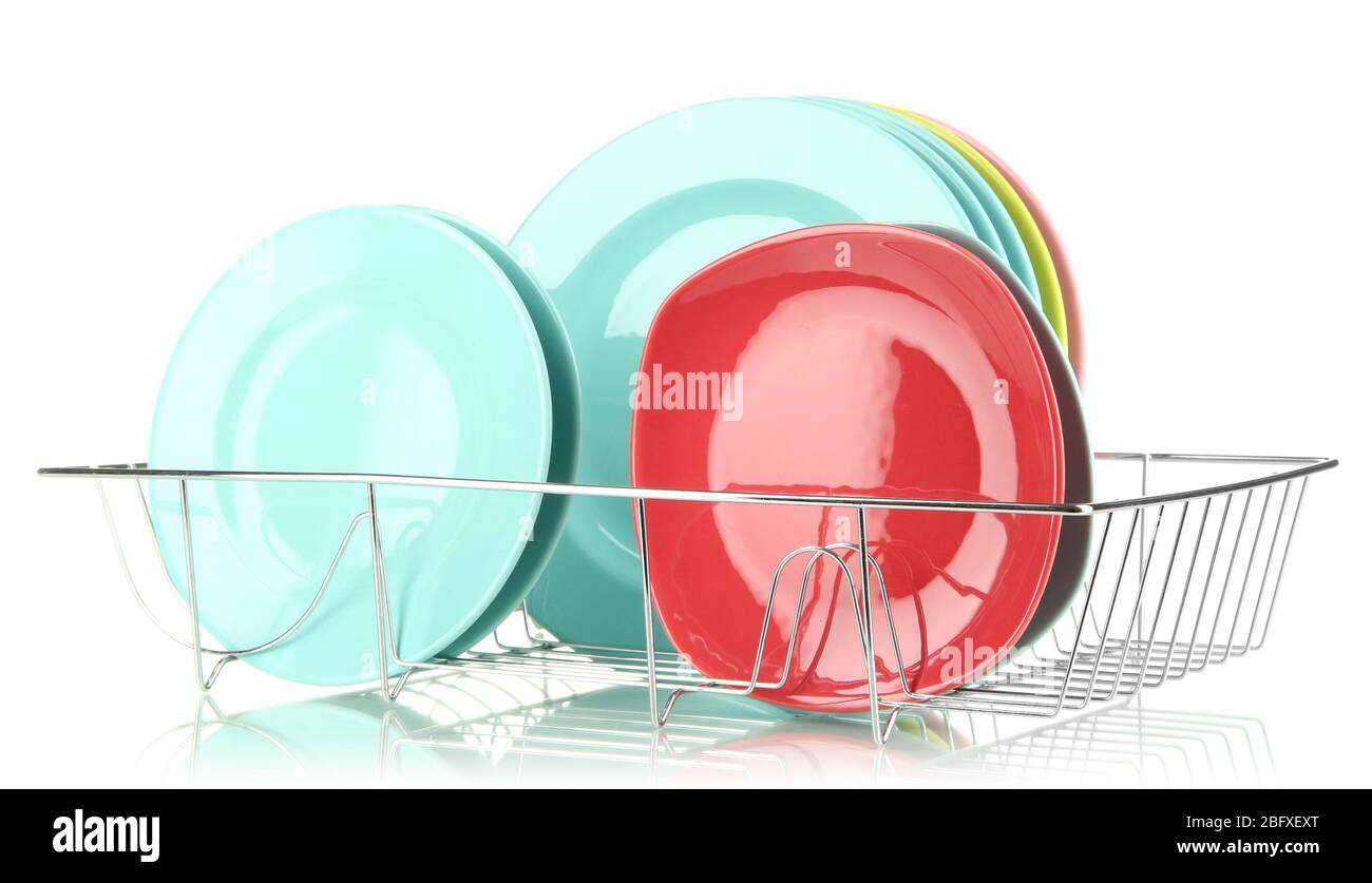Color plates in rack isolated on white Stock Photo - Alamy