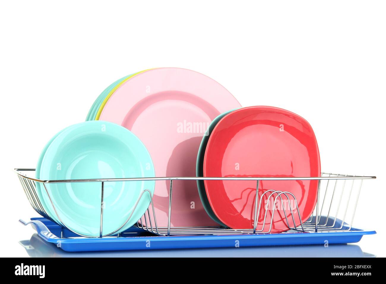 Color plates in rack isolated on white Stock Photo - Alamy