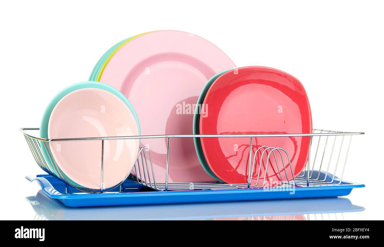 Color plates in rack isolated on white Stock Photo - Alamy