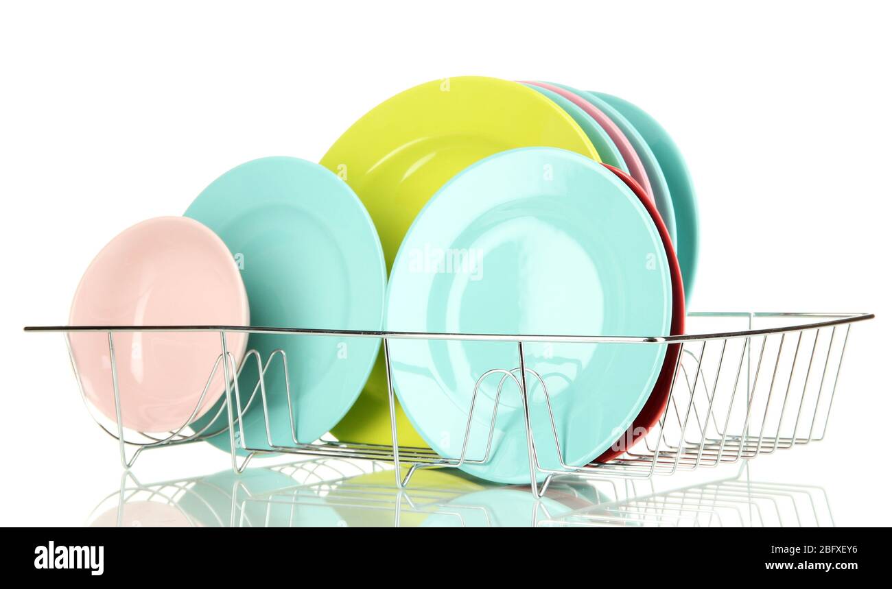 Color plates in rack isolated on white Stock Photo - Alamy