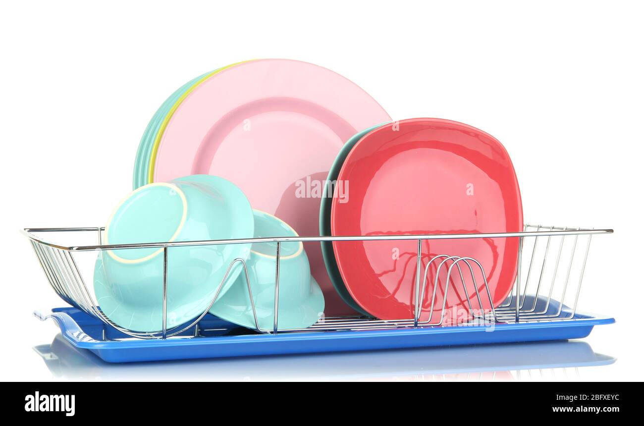 Color plates in rack isolated on white Stock Photo - Alamy