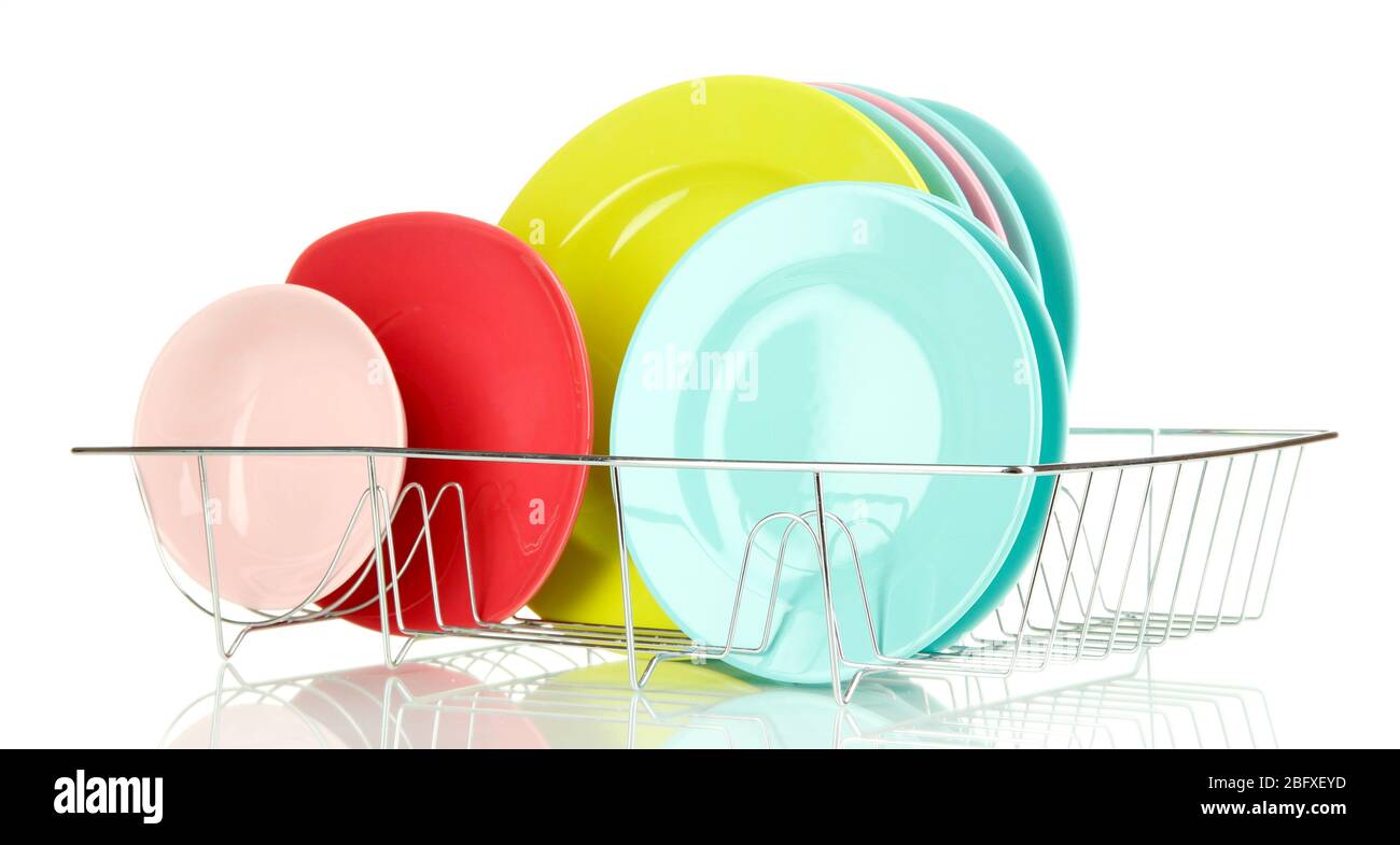 Color plates in rack isolated on white Stock Photo - Alamy