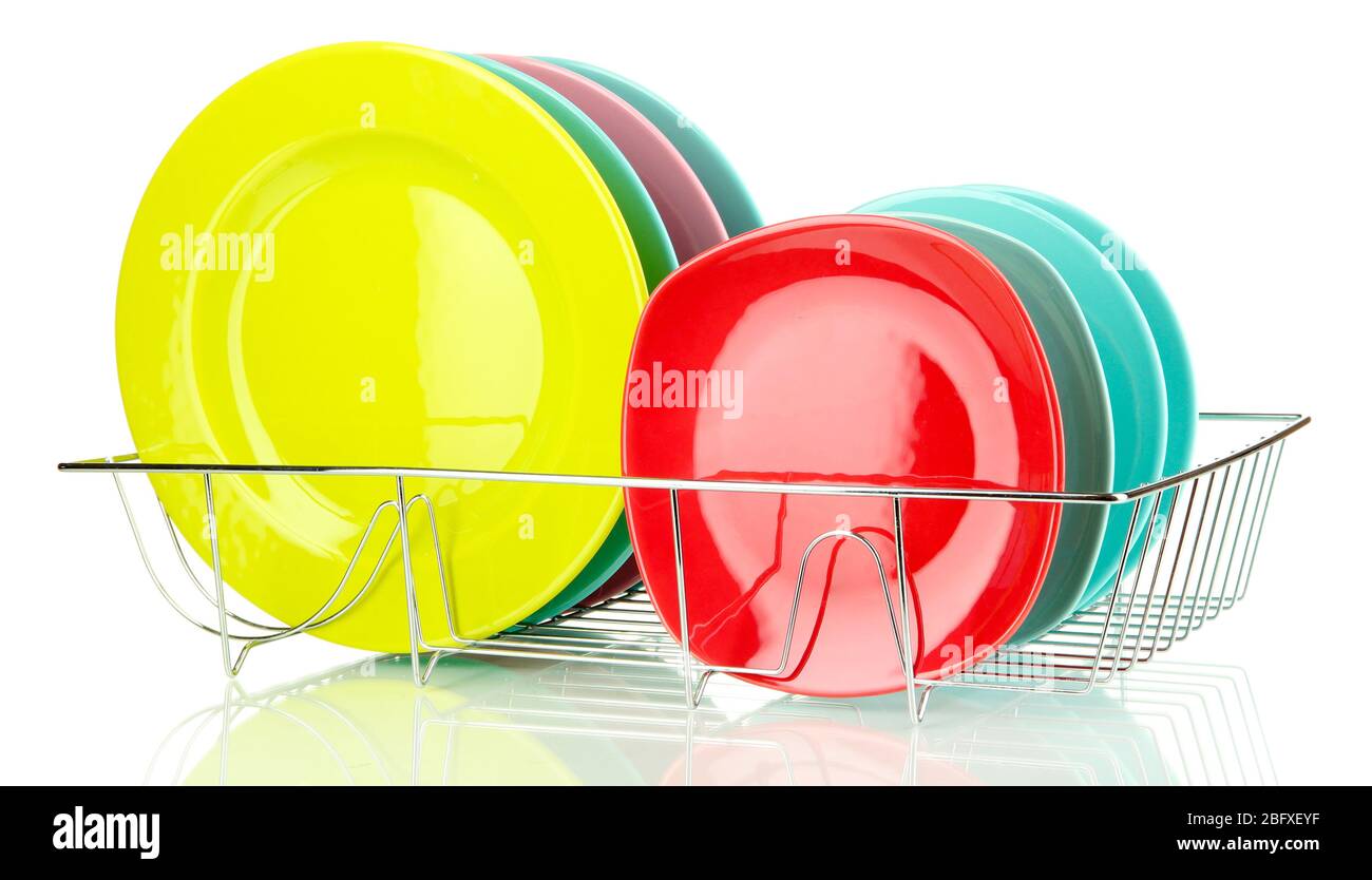 Color plates in rack isolated on white Stock Photo - Alamy