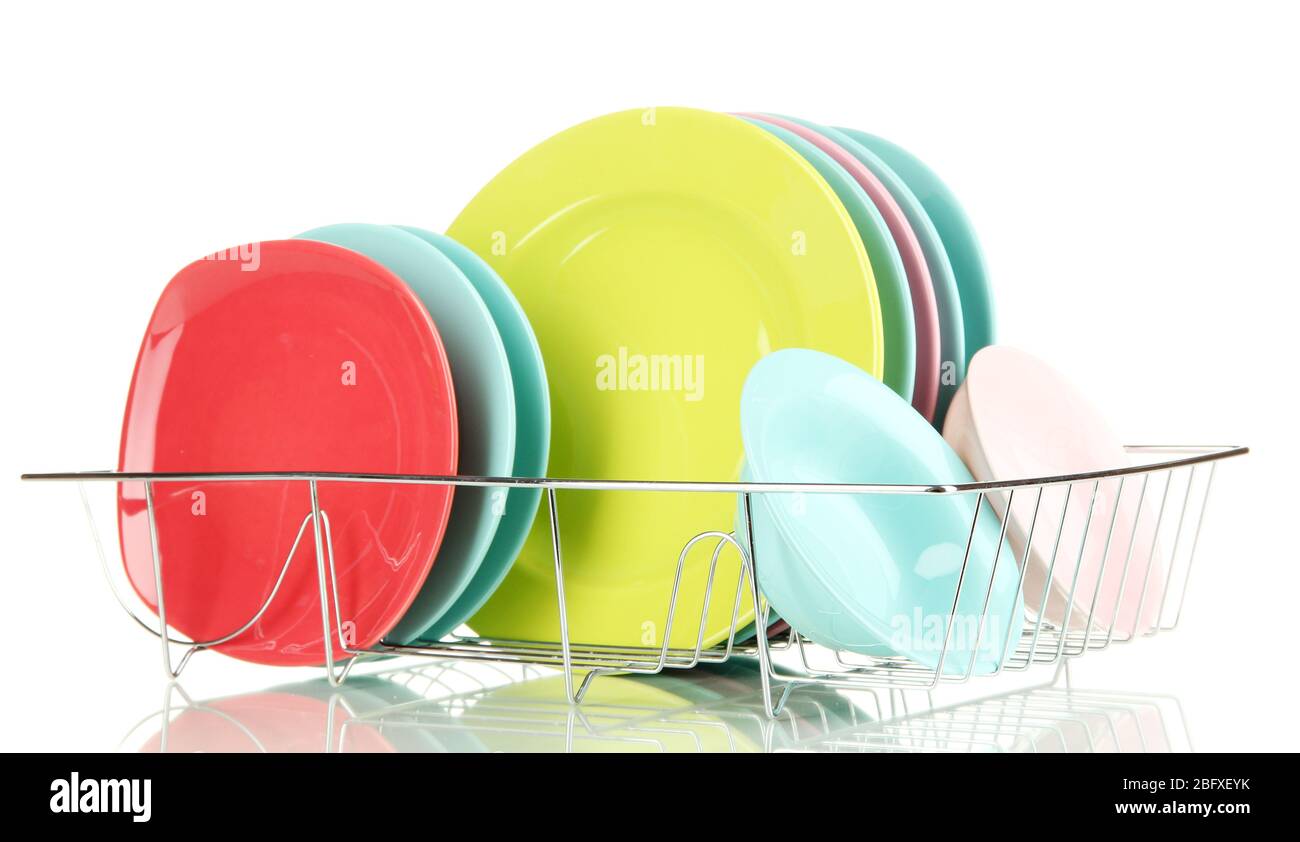 Color plates in rack isolated on white Stock Photo - Alamy