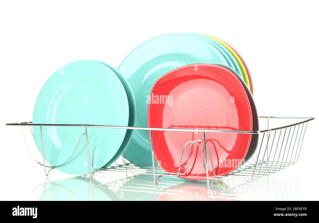 Color plates in rack isolated on white Stock Photo - Alamy