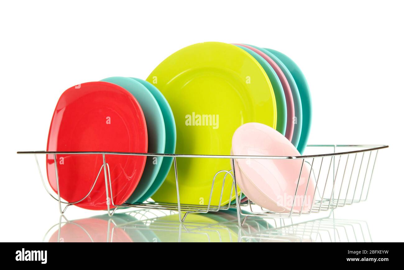 Color plates in rack isolated on white Stock Photo - Alamy