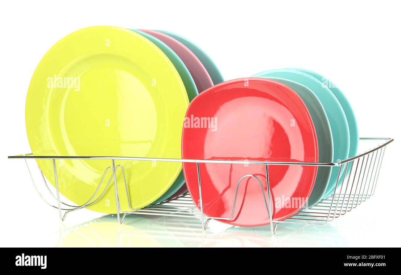 Color plates in rack isolated on white Stock Photo - Alamy