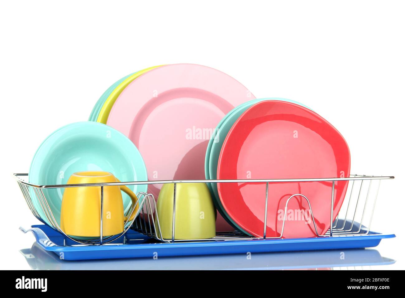 Color plates in rack isolated on white Stock Photo - Alamy