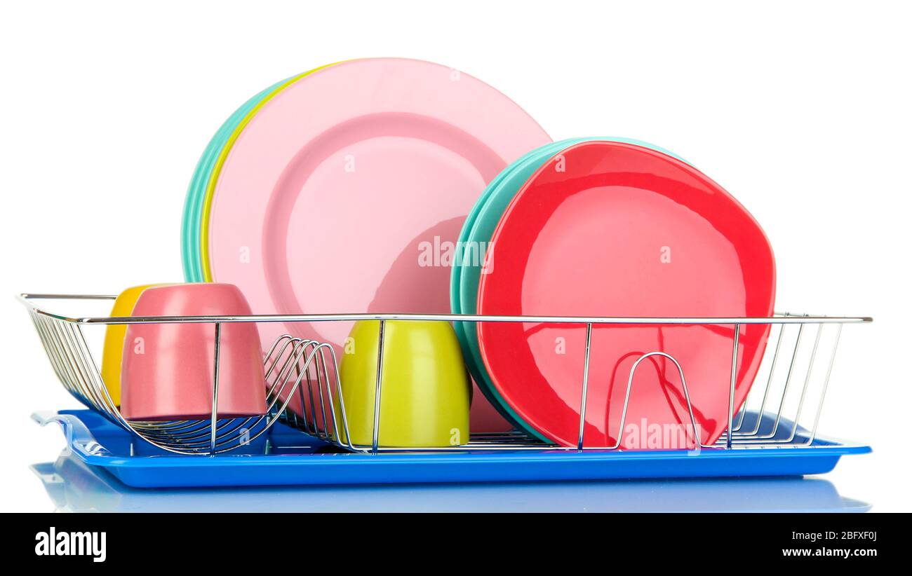 Color plates in rack isolated on white Stock Photo - Alamy