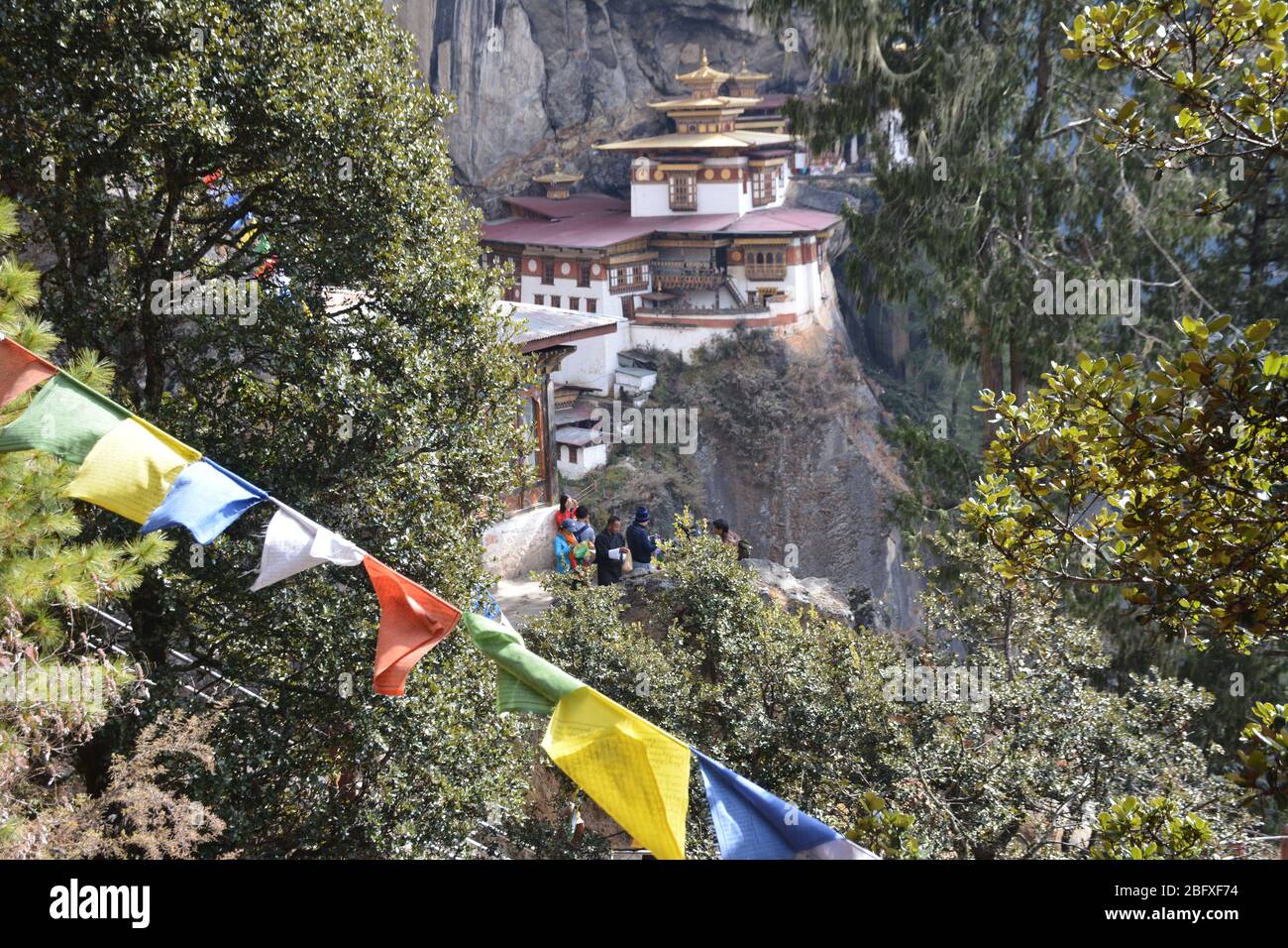 Visitors and locals on route to the Tiger's Nest monastery (also known ...