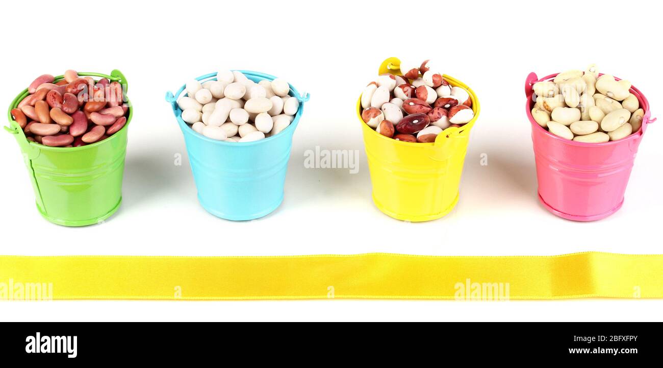 Different types of beans in colored buckets isolated on white Stock ...