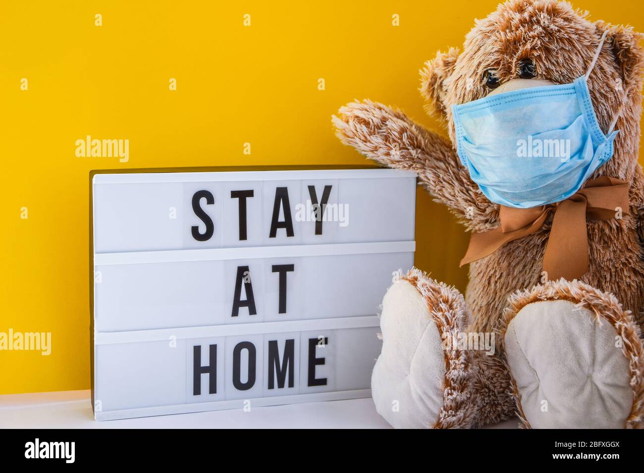 Coronavirus covid-19 and pollution protection concept. teddy bear doll ...