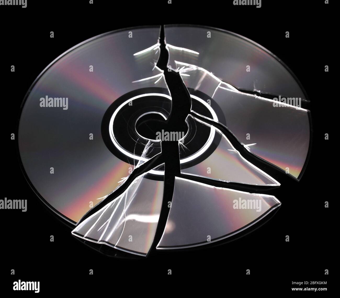 Broken disk with information isolated on black Stock Photo - Alamy