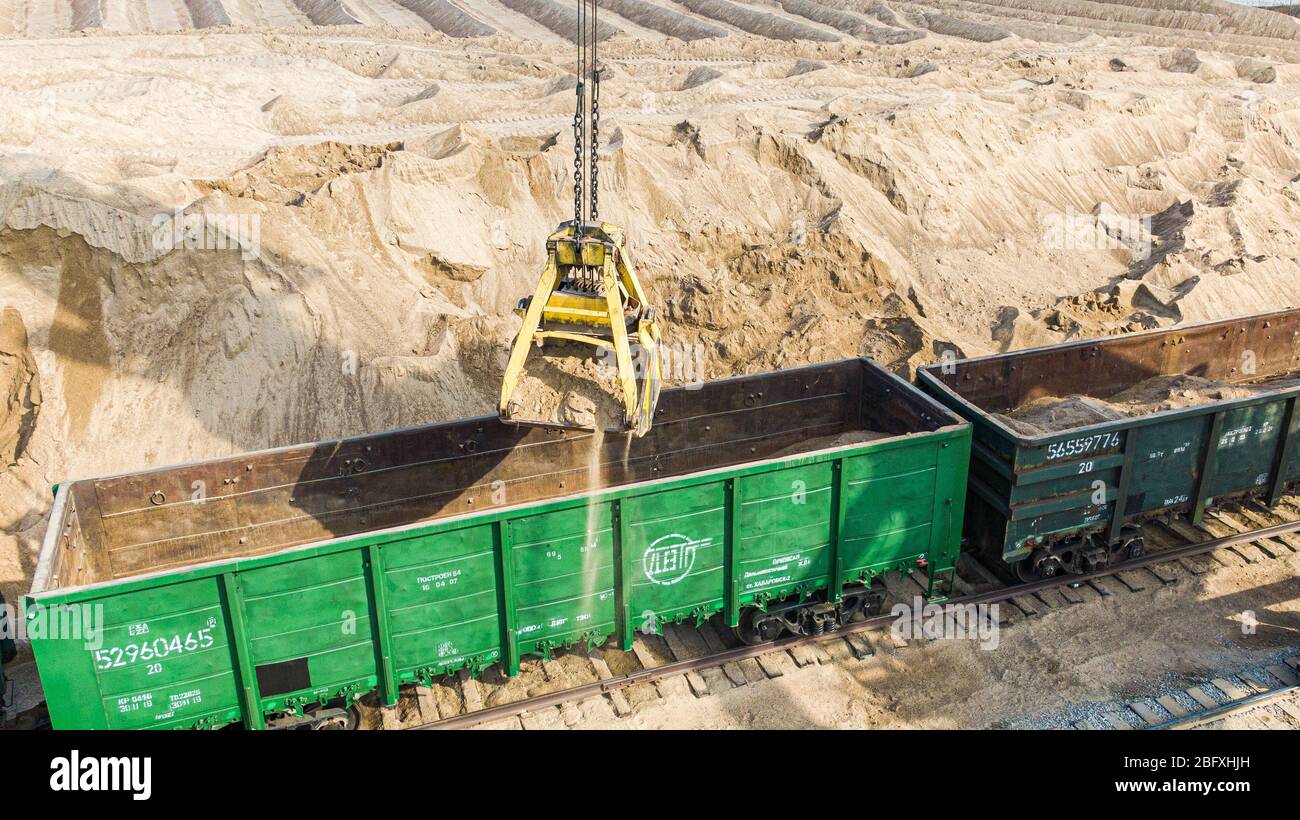 top view, loading sand into wagons Stock Photo - Alamy