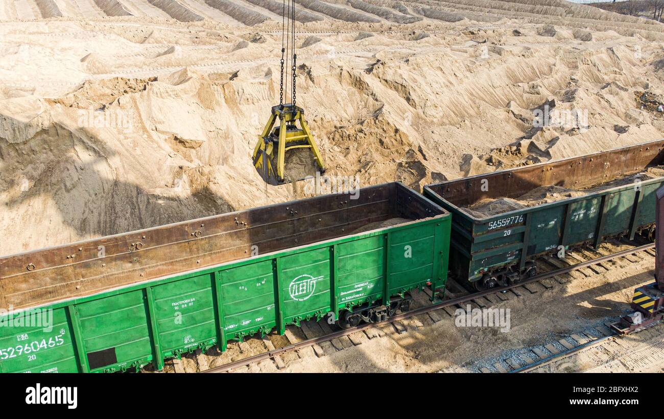 top view, loading sand into wagons Stock Photo - Alamy