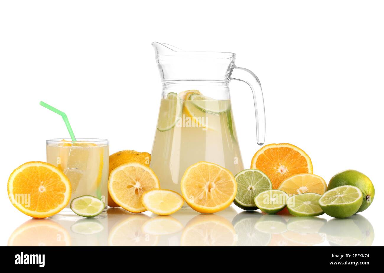 Citrus lemonade in pitcher and glass of citrus around isolated on white ...