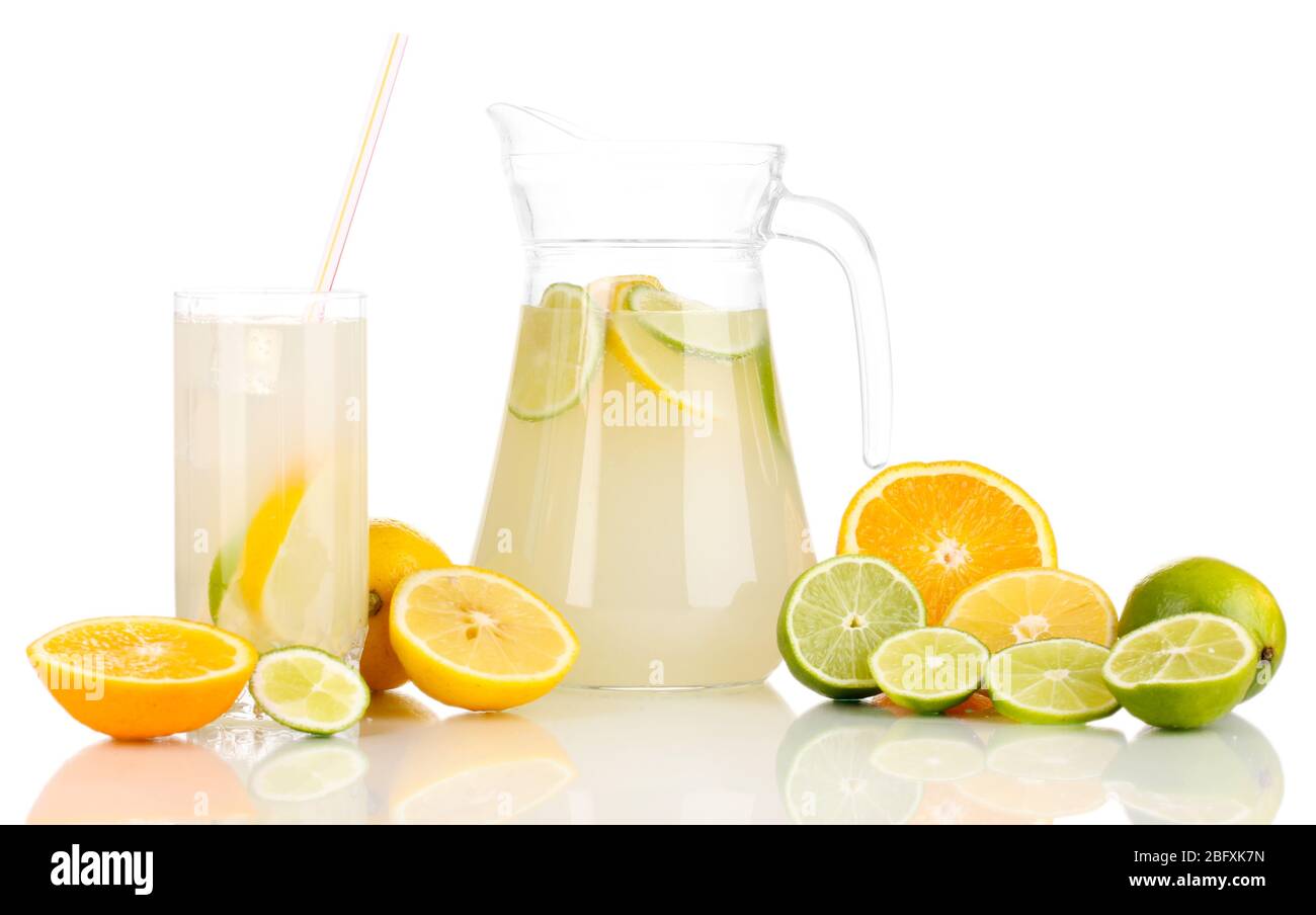 Citrus lemonade in pitcher and glass of citrus around isolated on white ...