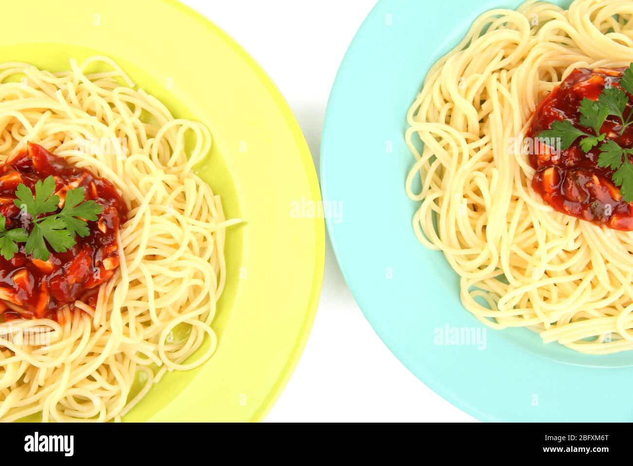 Italian spaghetti in plates isolated on white Stock Photo - Alamy