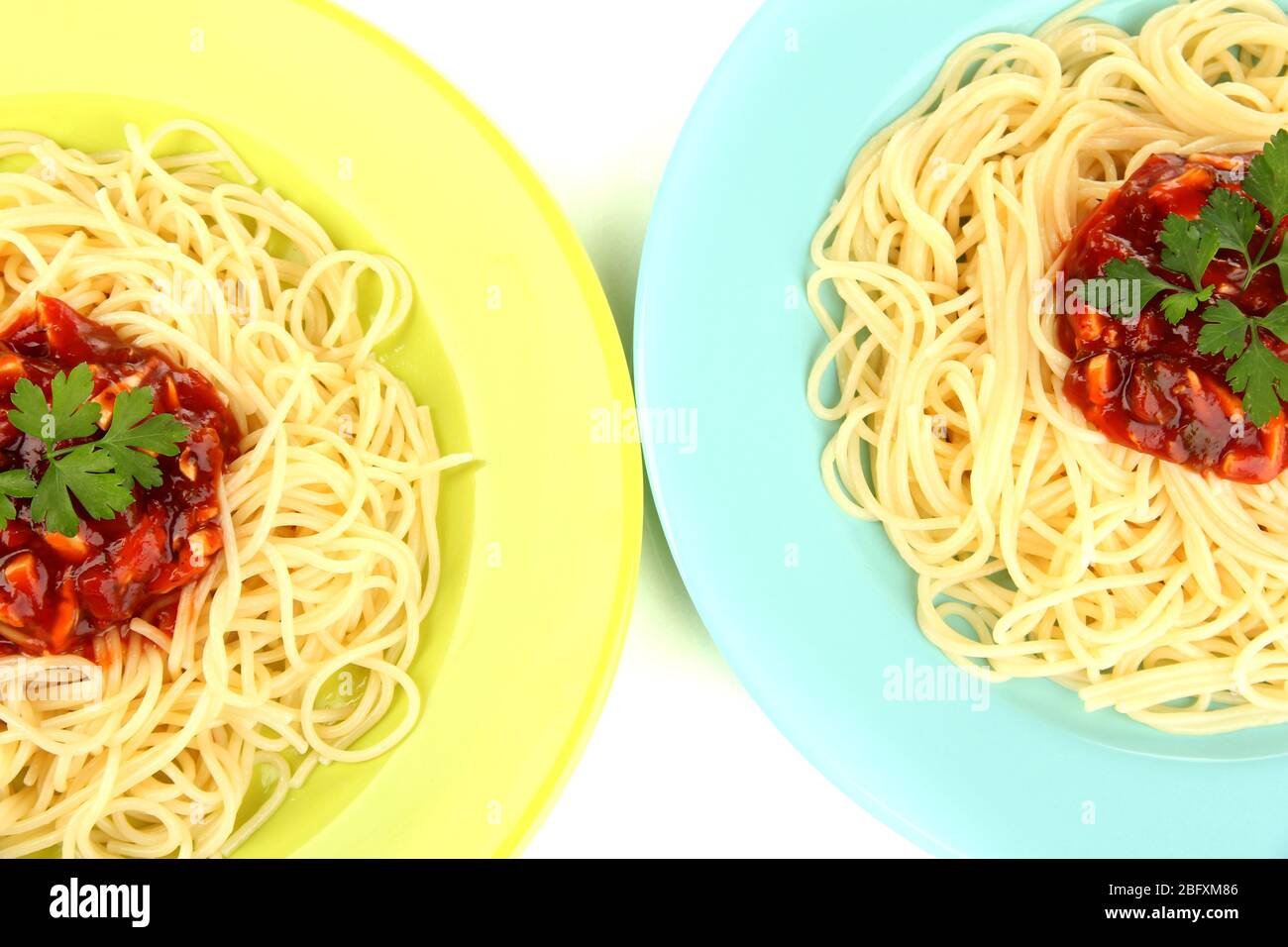 Italian spaghetti in plates isolated on white Stock Photo - Alamy
