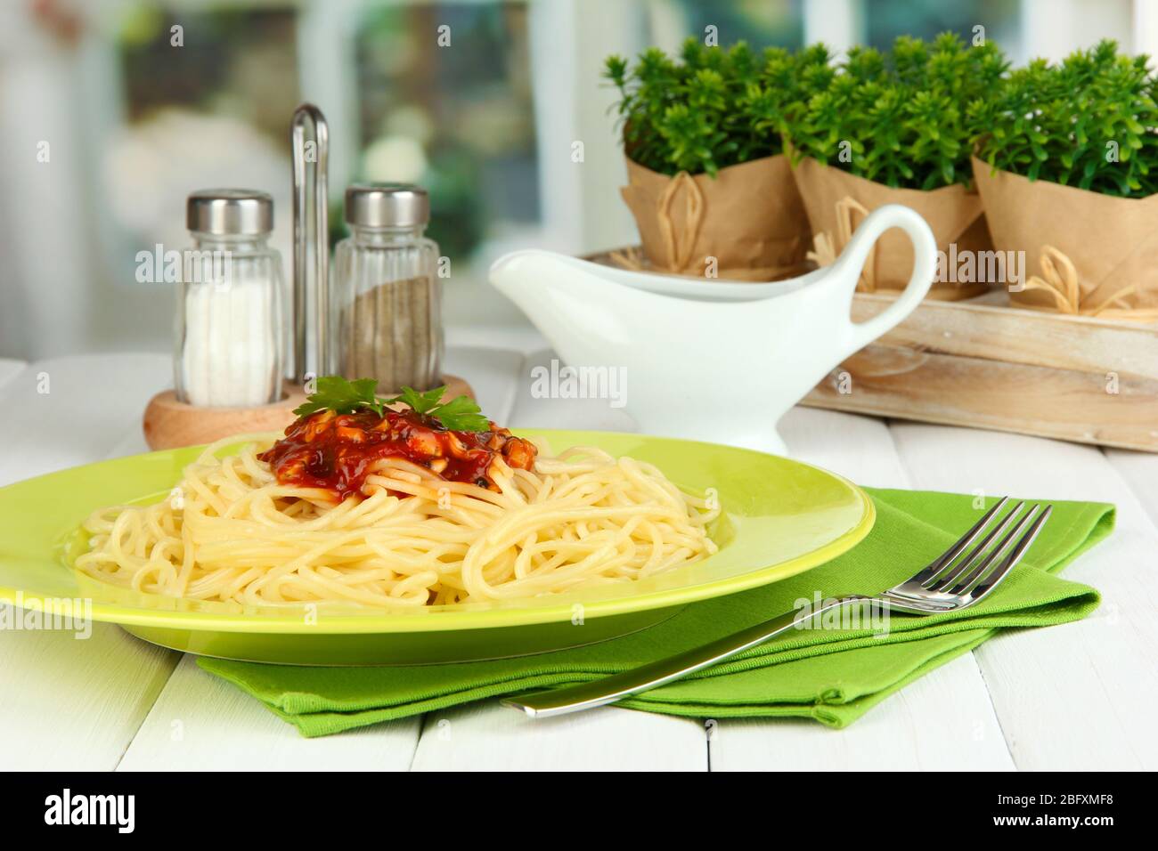 Italian spaghetti served in cafe Stock Photo - Alamy