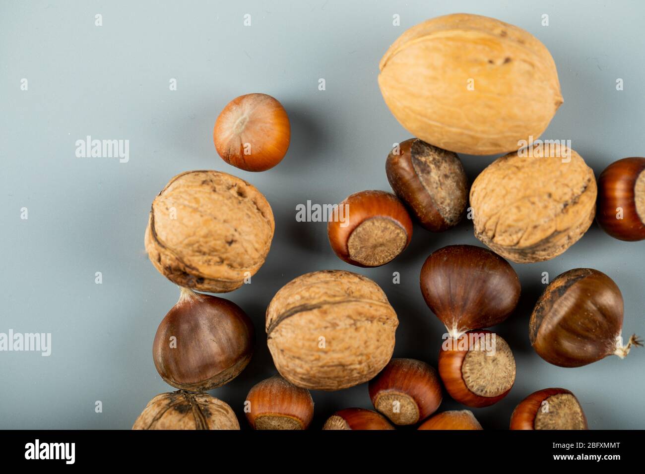Autumn fruits, walnut and chestnuts Stock Photo - Alamy