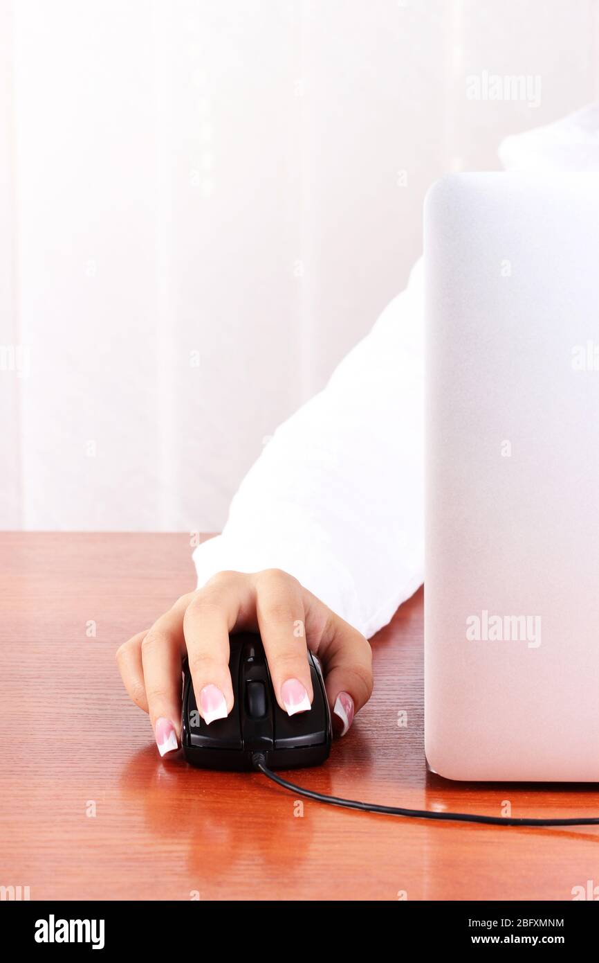 woman's hands pushing keys of pc mouse, close-up Stock Photo - Alamy