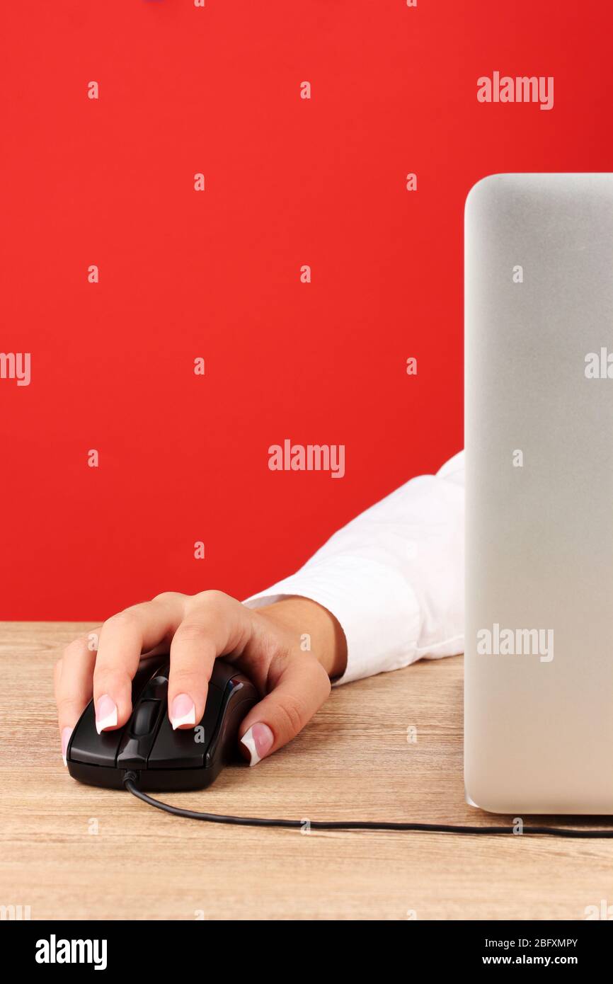 Woman's finger and computer mouse hi-res stock photography and images ...