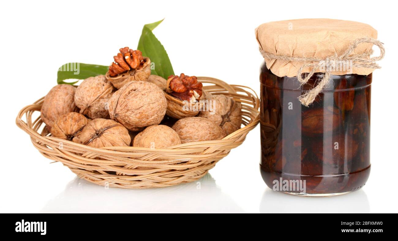 jam-jar of walnuts and a basket with walnuts Stock Photo - Alamy