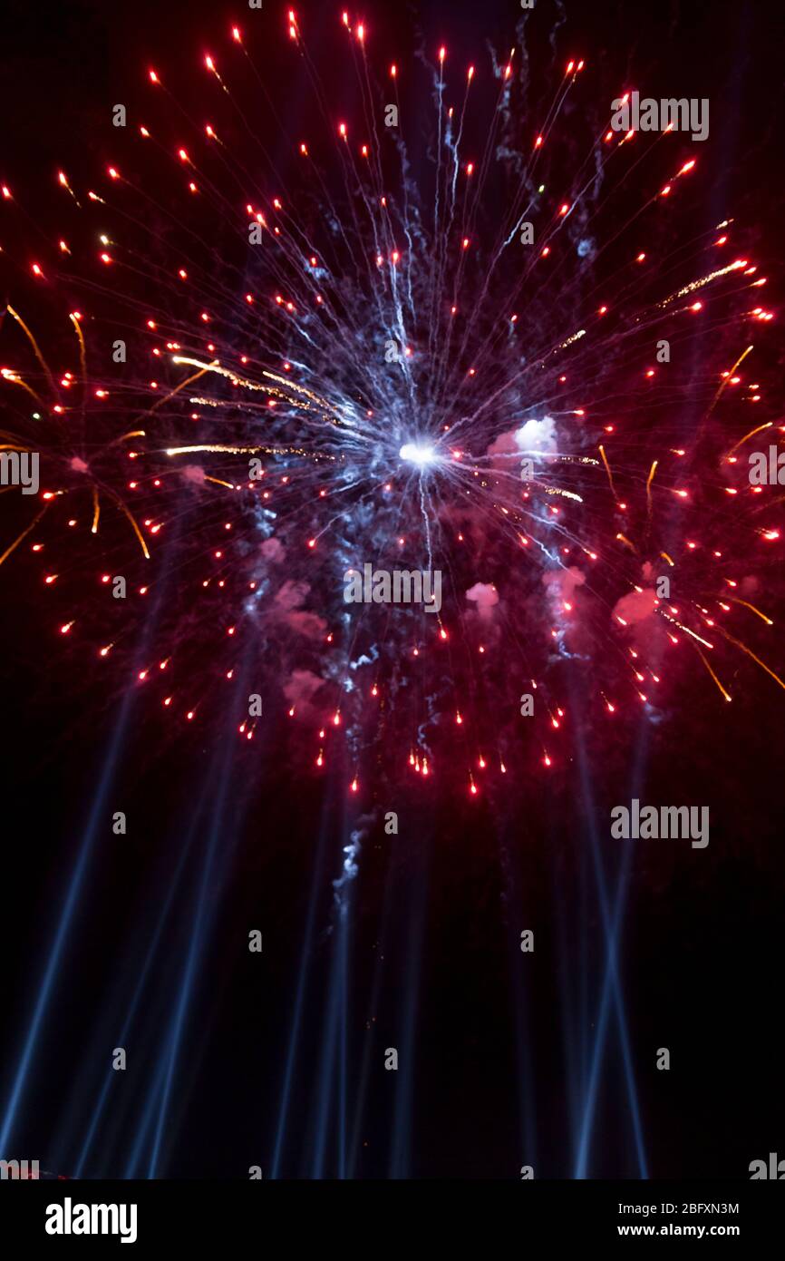 red fireworks on the black sky background. Celebration Stock Photo - Alamy