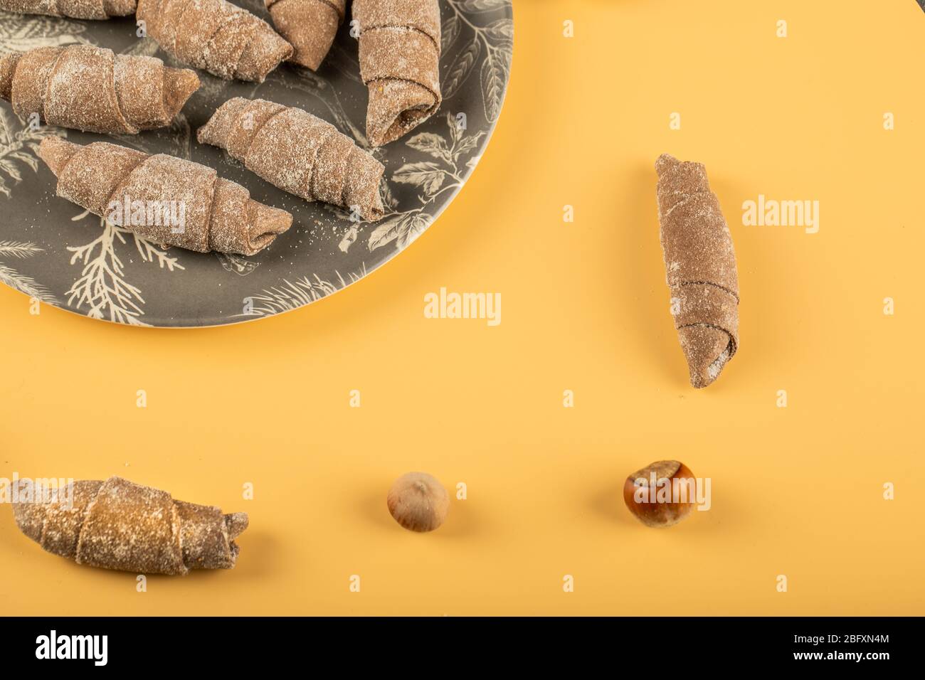 Traditional mutaki made with cocoa dough in black platter Stock Photo ...